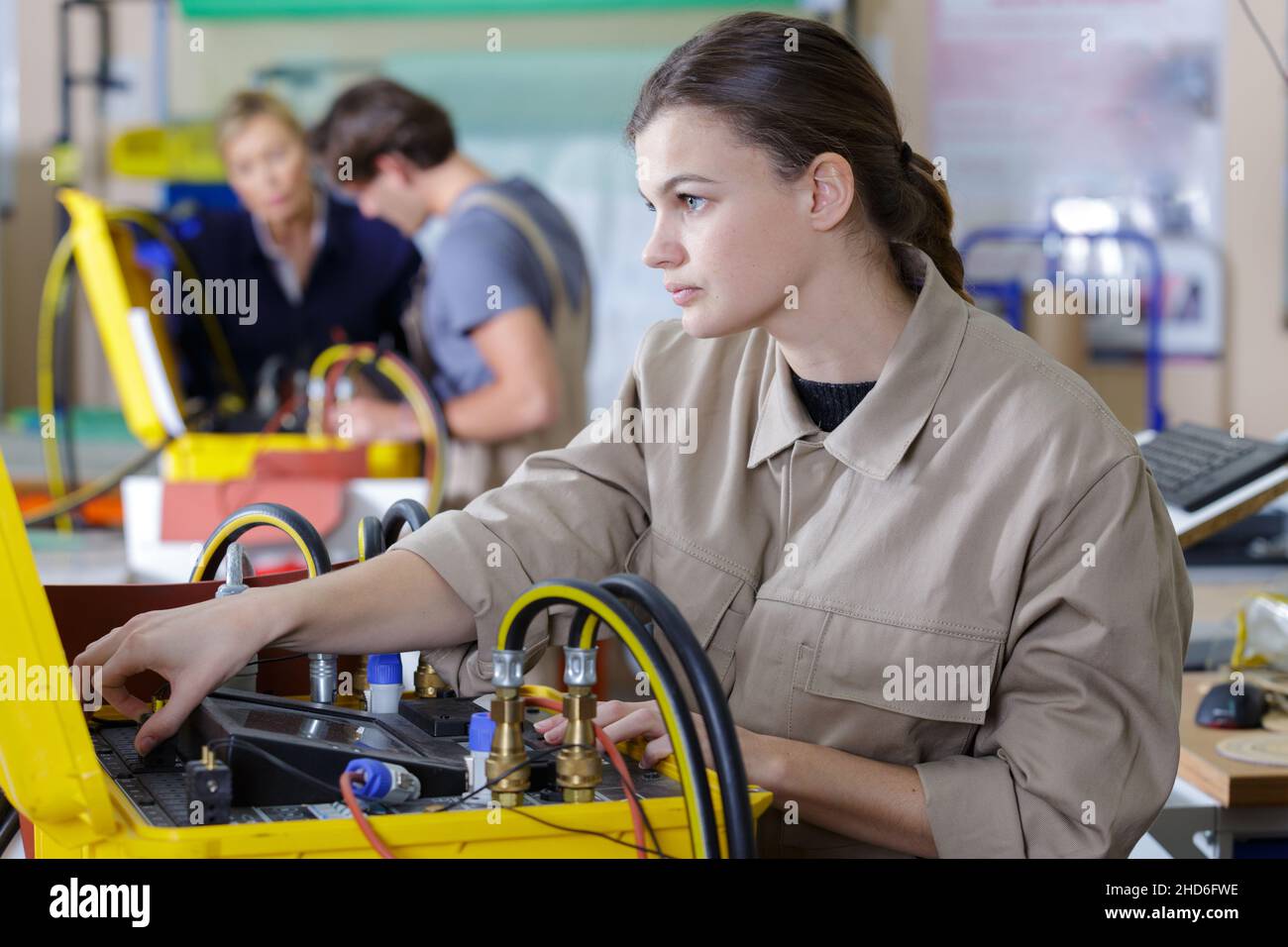young people in technical vocational training with teacher Stock Photo ...