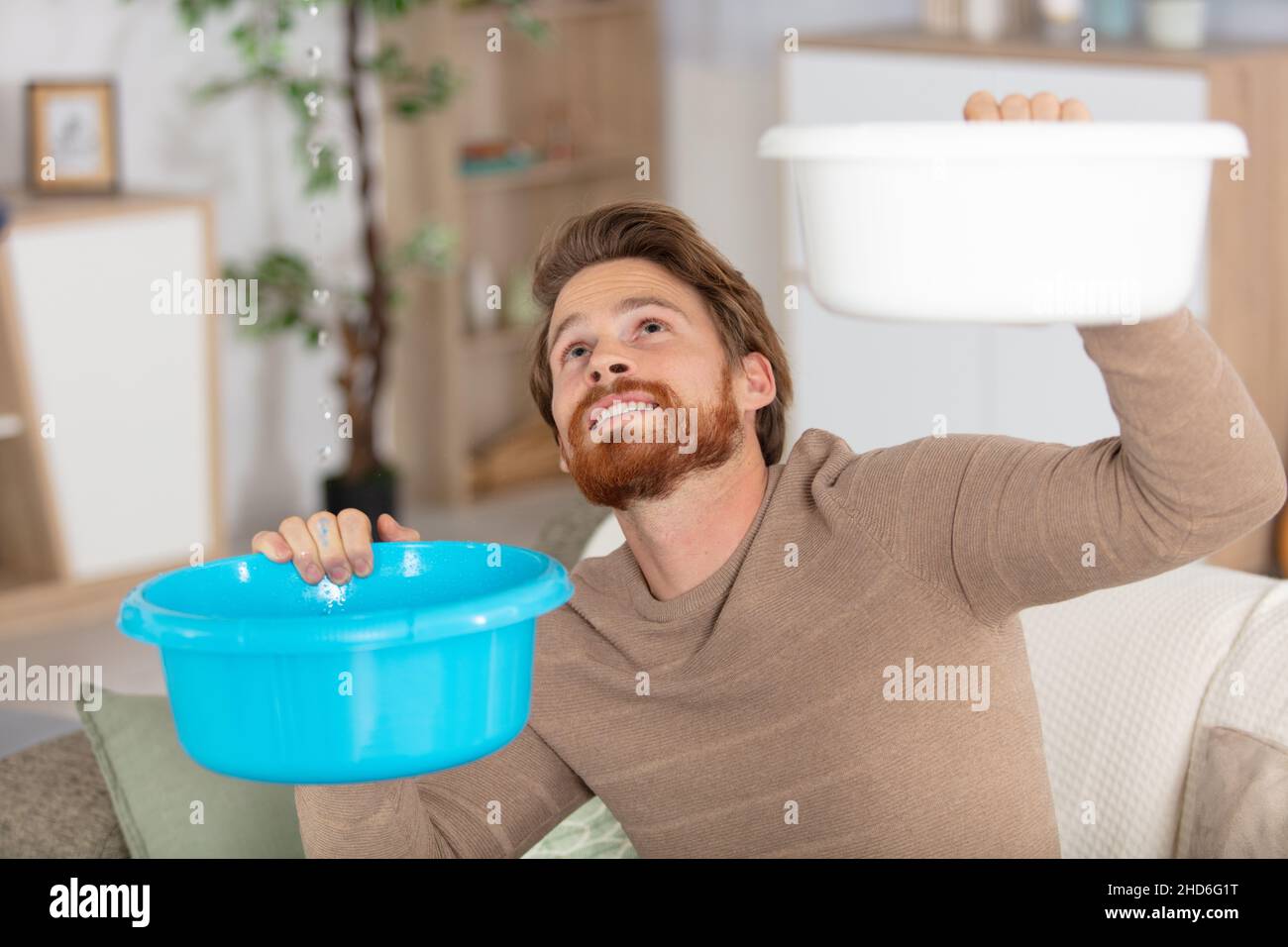 Water bucket home drip hi-res stock photography and images - Alamy