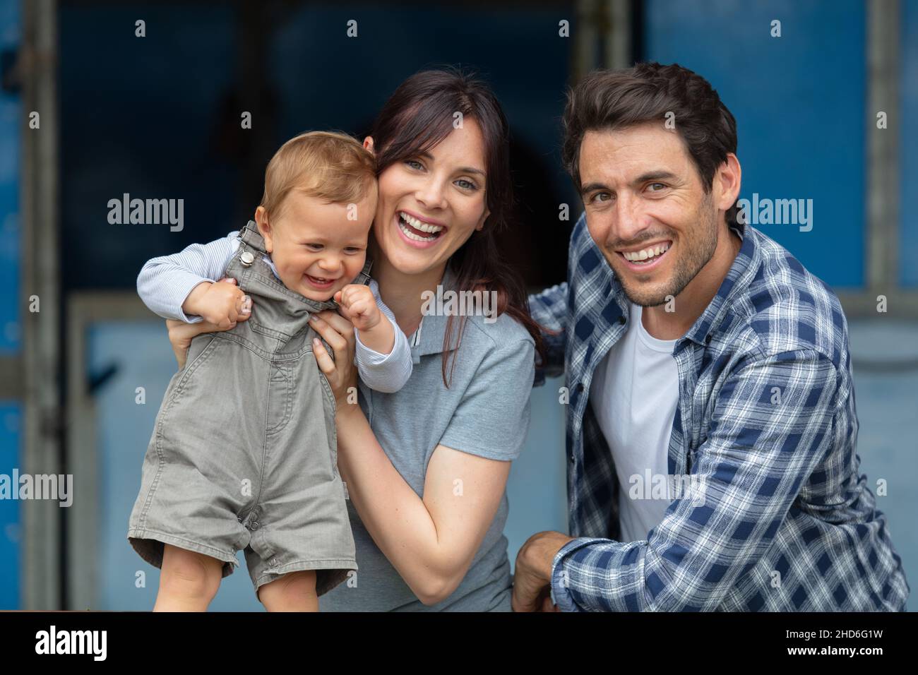 happy family having fun together in a farm Stock Photo - Alamy