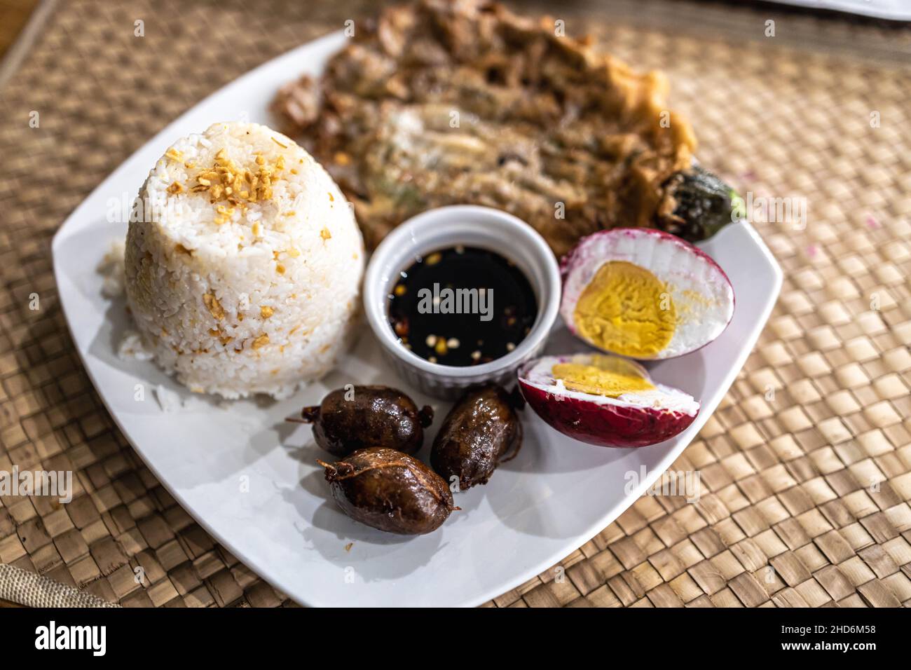 Popular Filipino food Tortang talong with rice and salted egg at ...