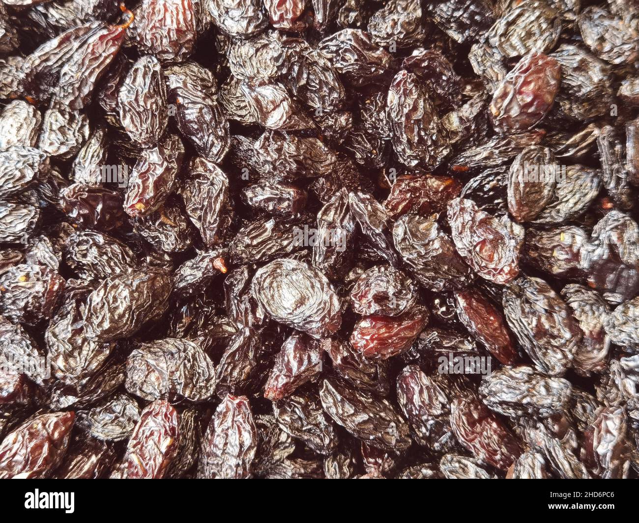 dried plums in bulk but isolated Stock Photo - Alamy