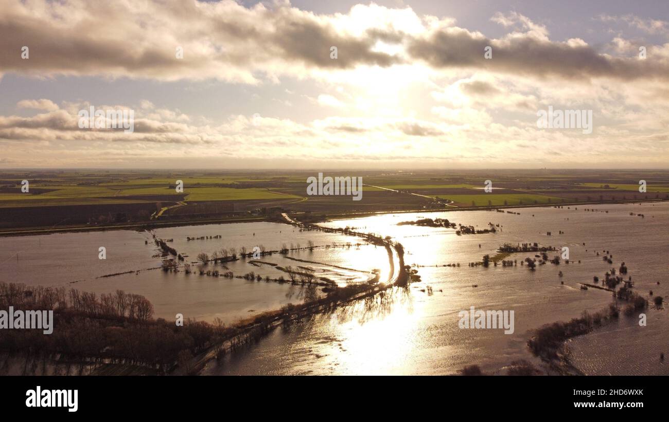 Welney, UK. 31st Dec, 2021. The Welney wash area is beginning to fill ...