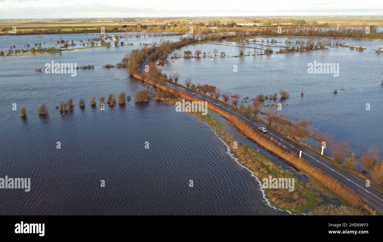 Welney, UK. 31st Dec, 2021. The Welney wash area is beginning to fill ...