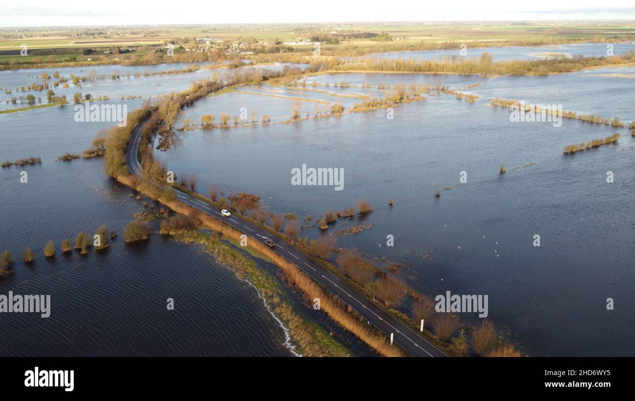 Welney, UK. 31st Dec, 2021. The Welney wash area is beginning to fill ...