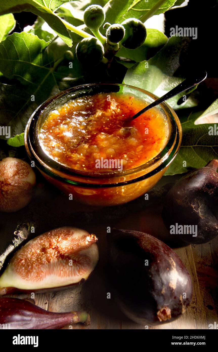 Traditional fig jam set with natural fig tree elements Stock Photo - Alamy