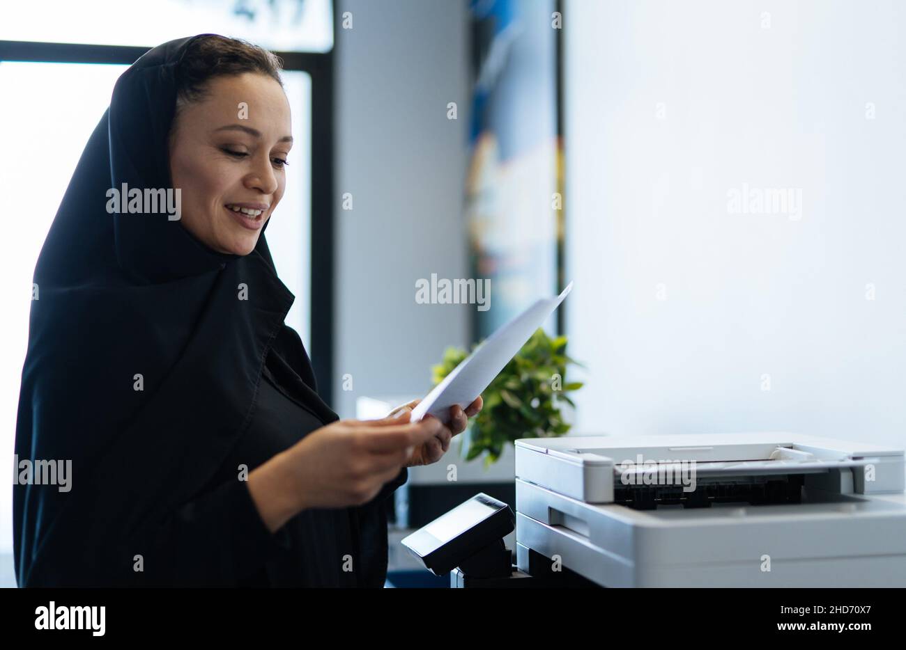 Beautiful female employee hi-res stock photography and images - Alamy