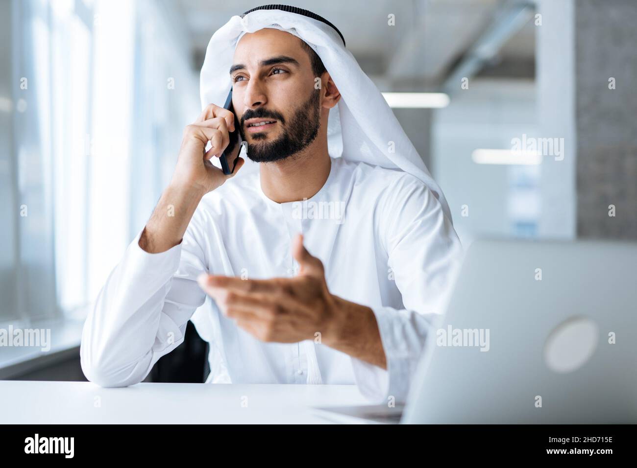 Office working people working in uae hi-res stock photography and ...