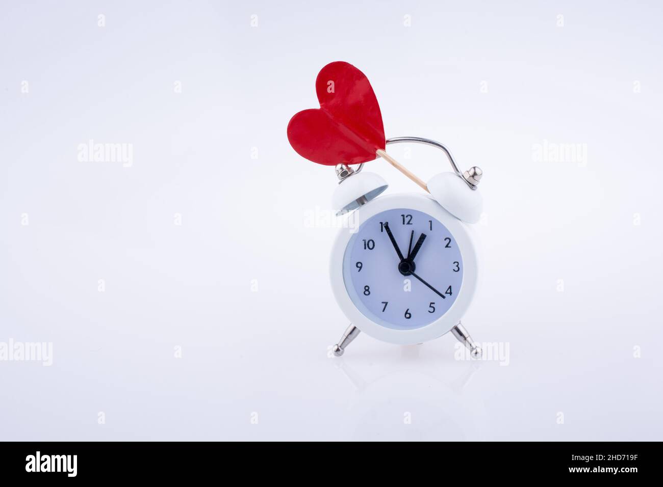 Heart shape clock hi-res stock photography and images - Alamy