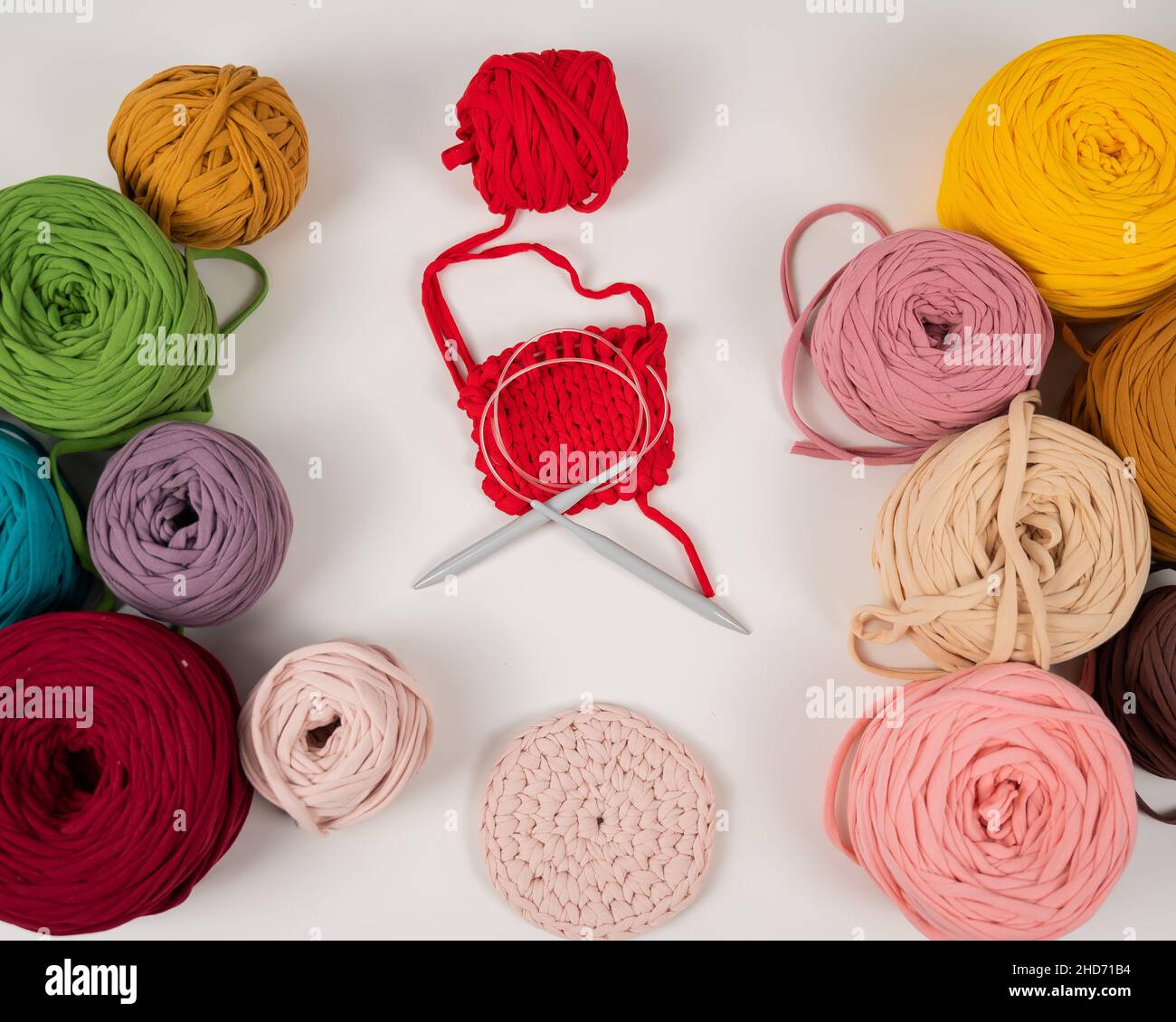 cotton yarn knitting pattern on white table Stock Photo - Alamy