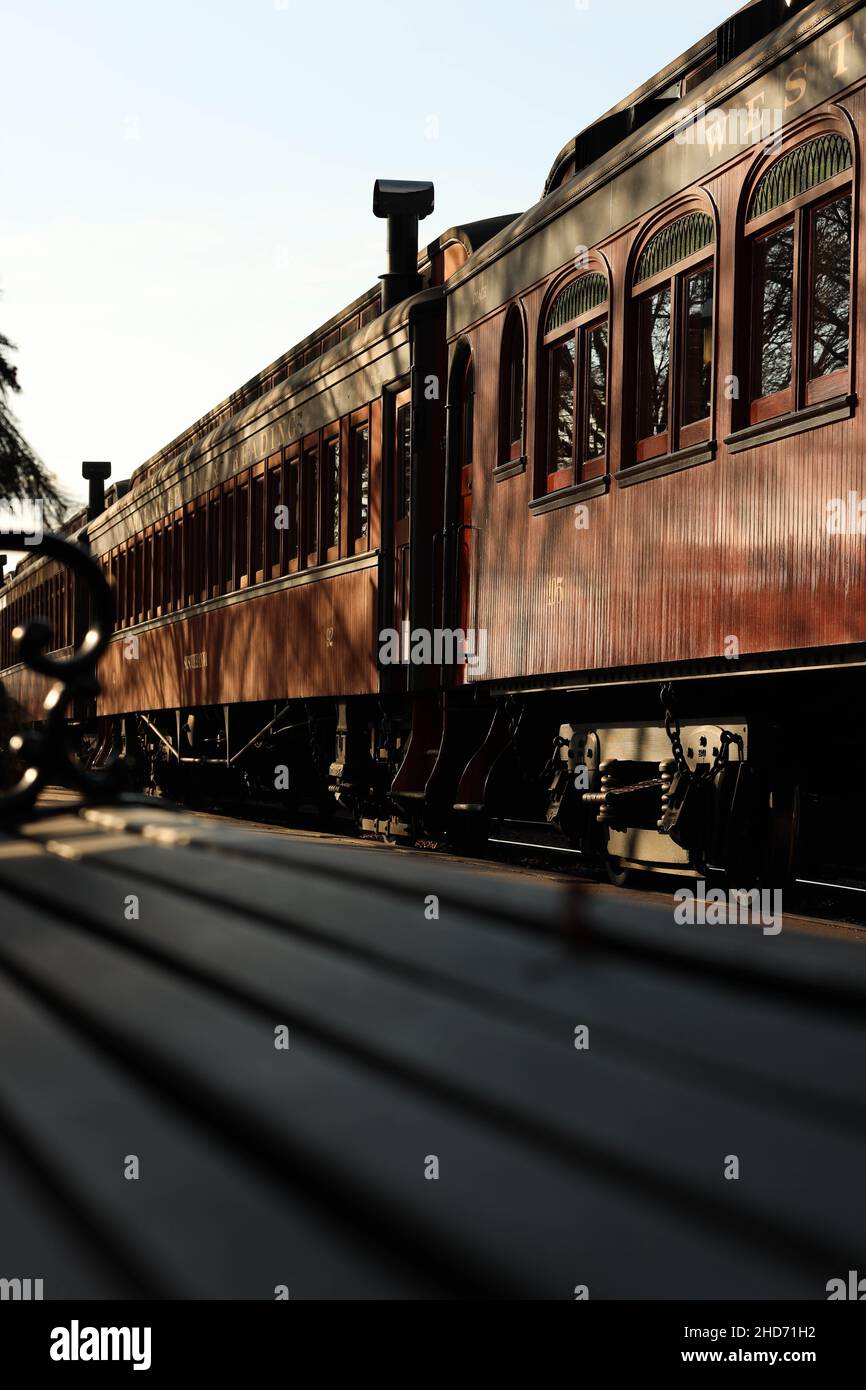 Side view of a brown train railroad wagons against a light sly Stock ...