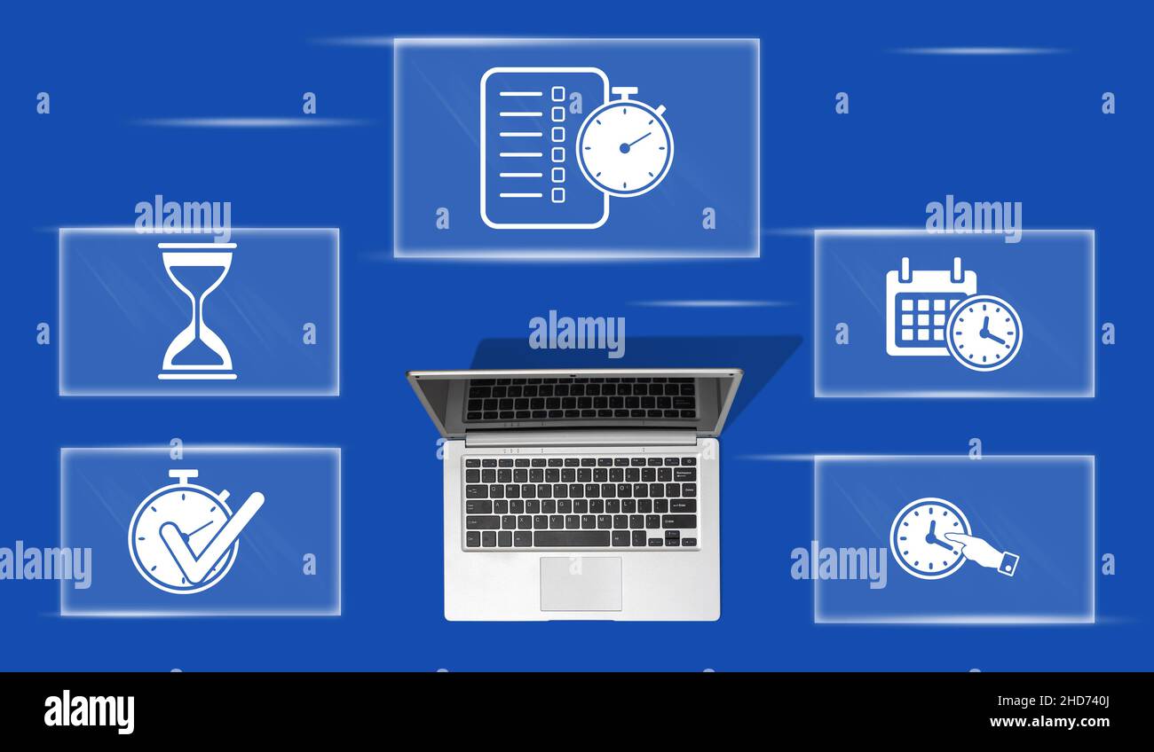 Top view of laptop with symbol of time management concept Stock Photo ...