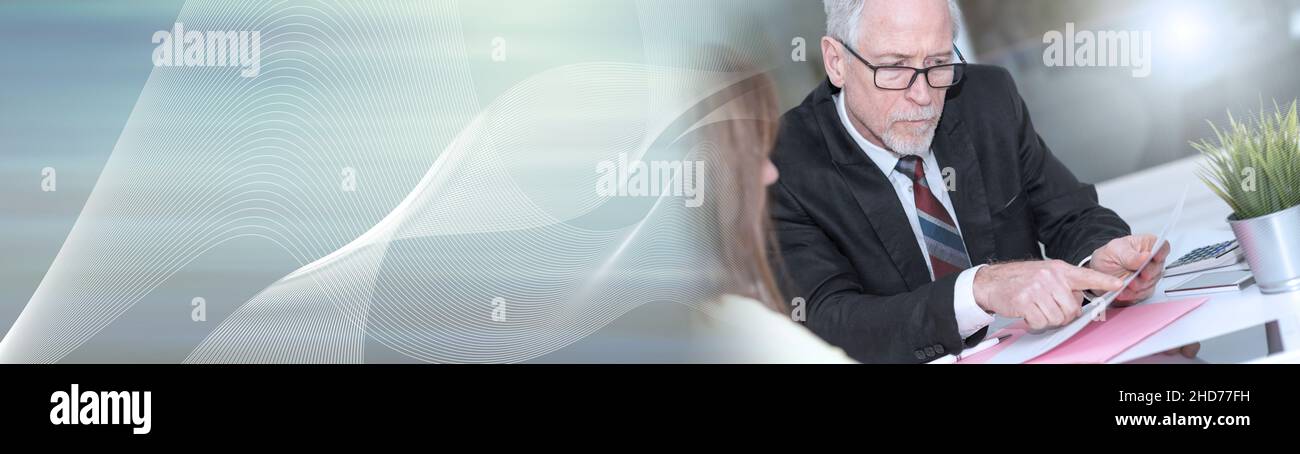 Financial consultant giving advices to female client, light effect ...