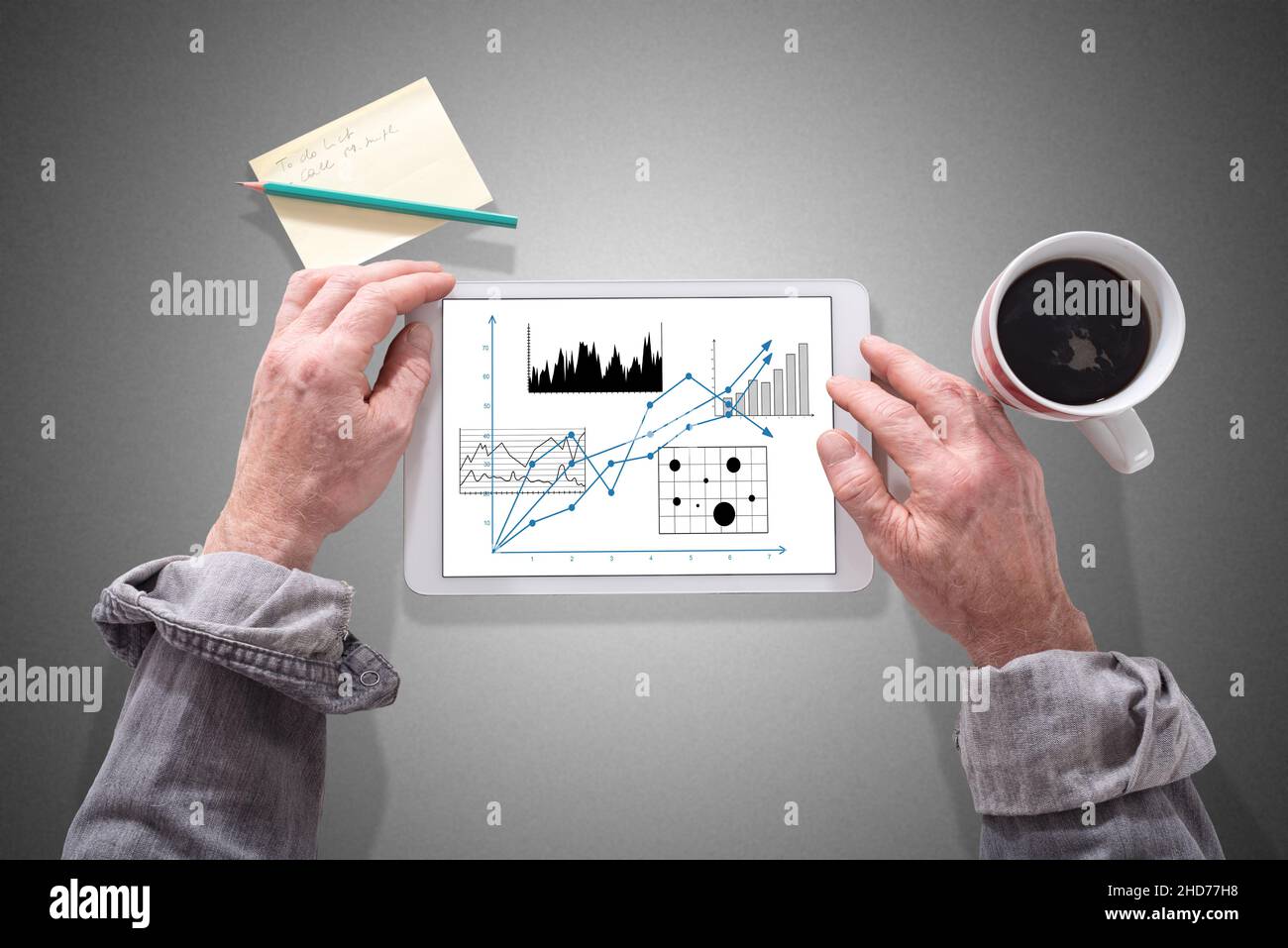 Male hands using a tablet showing business analysis concept Stock Photo ...