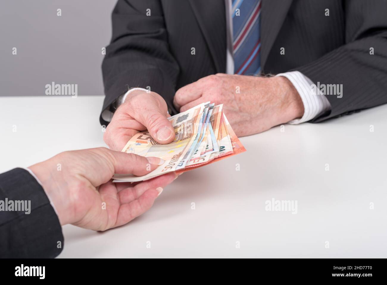 Person handling money hi-res stock photography and images - Alamy