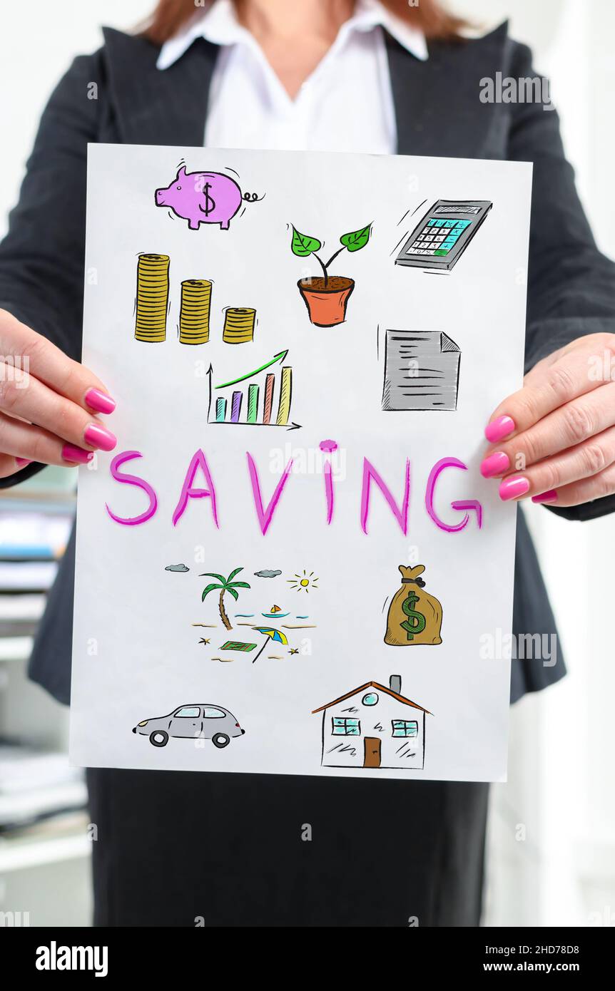 Paper with saving concept held by a businesswoman Stock Photo - Alamy