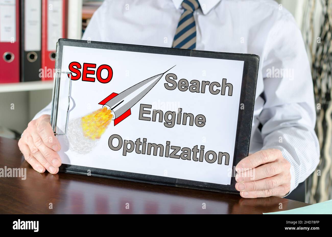 Seo concept shown by a businessman Stock Photo - Alamy