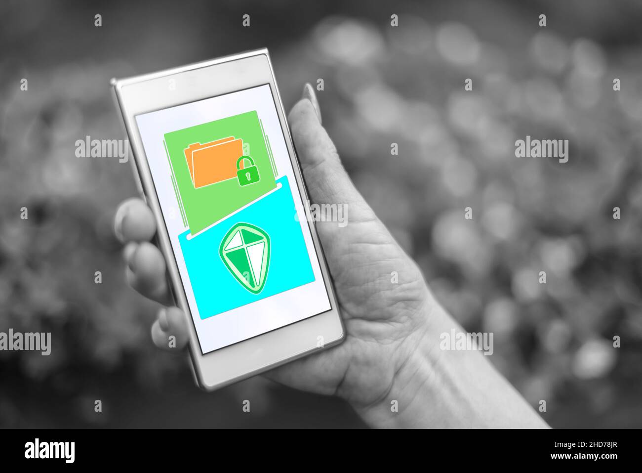 Female hand holding a smartphone with data protection concept Stock ...