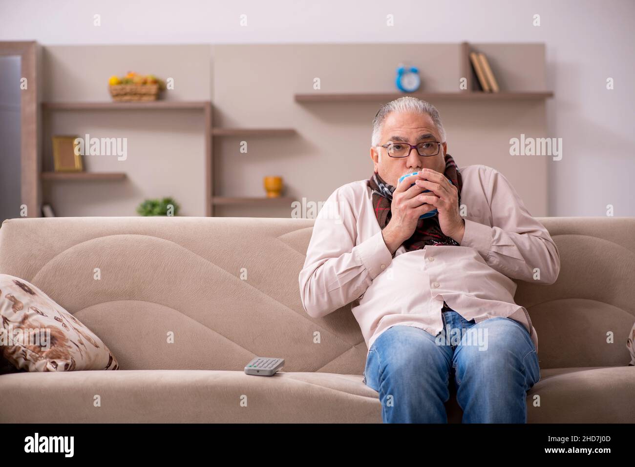 Old man pensioner suffering at home Stock Photo - Alamy