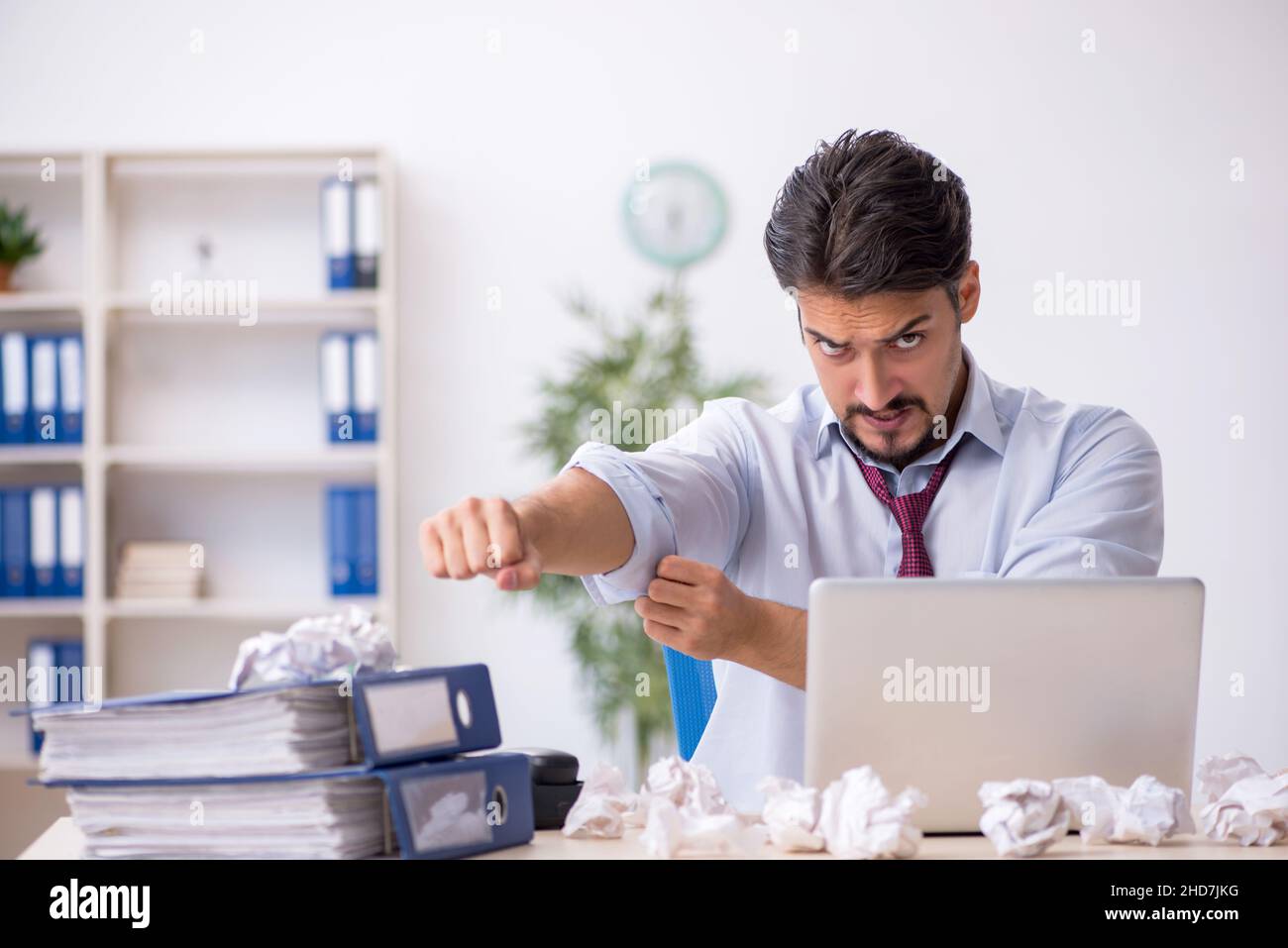 Young businessman employee in rejected ideas concept Stock Photo - Alamy