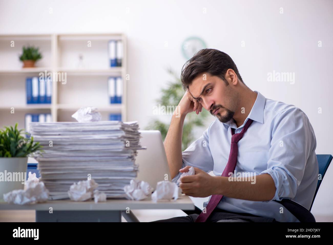 Young businessman employee in rejected ideas concept Stock Photo - Alamy