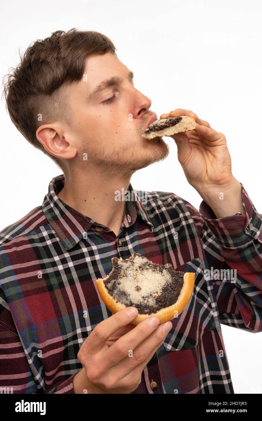 Man biting chocolate hi-res stock photography and images - Alamy