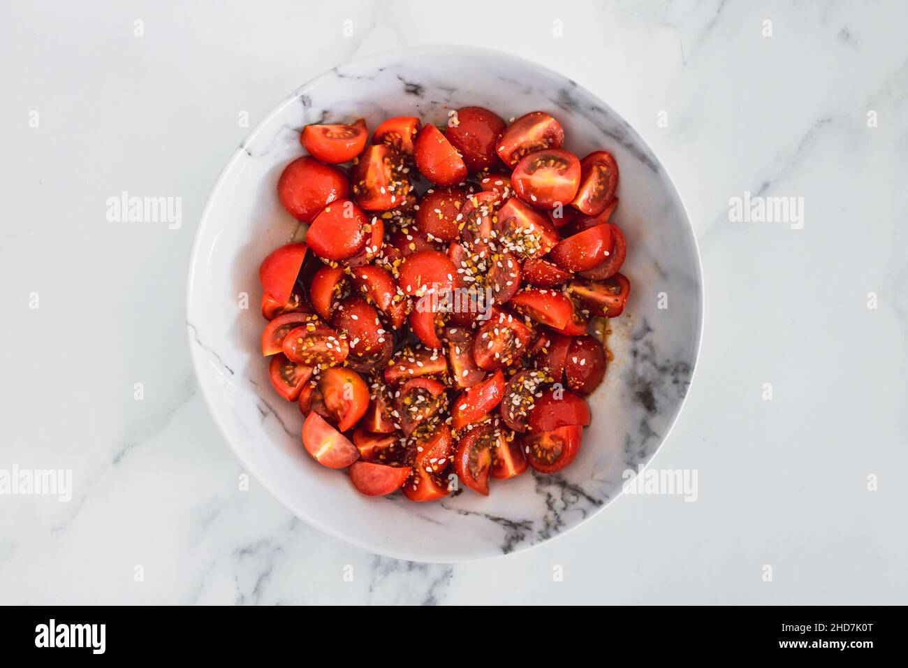 fresh ripe cherry tomatoes cut into cubes seasoned with olive oil ...