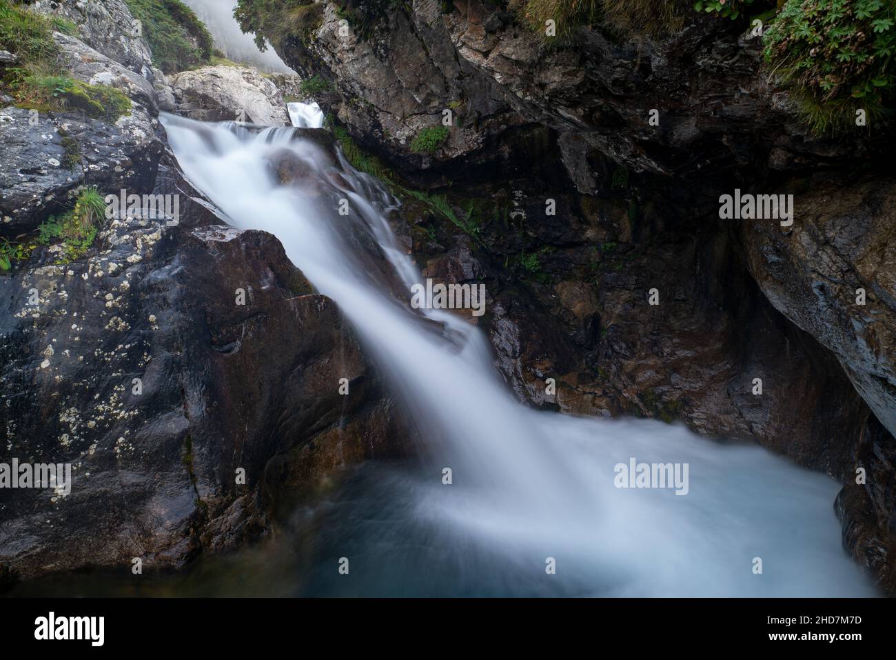 Cascades of the waterfall flowing from the ice circus in the French ...
