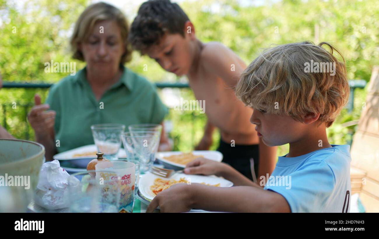 Outside family meal candid hi-res stock photography and images - Alamy