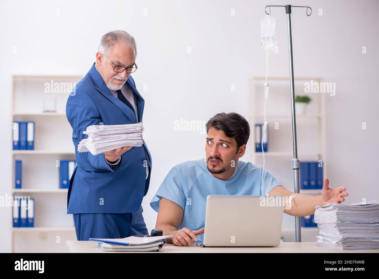 Young employee feeling bad at workplace Stock Photo - Alamy