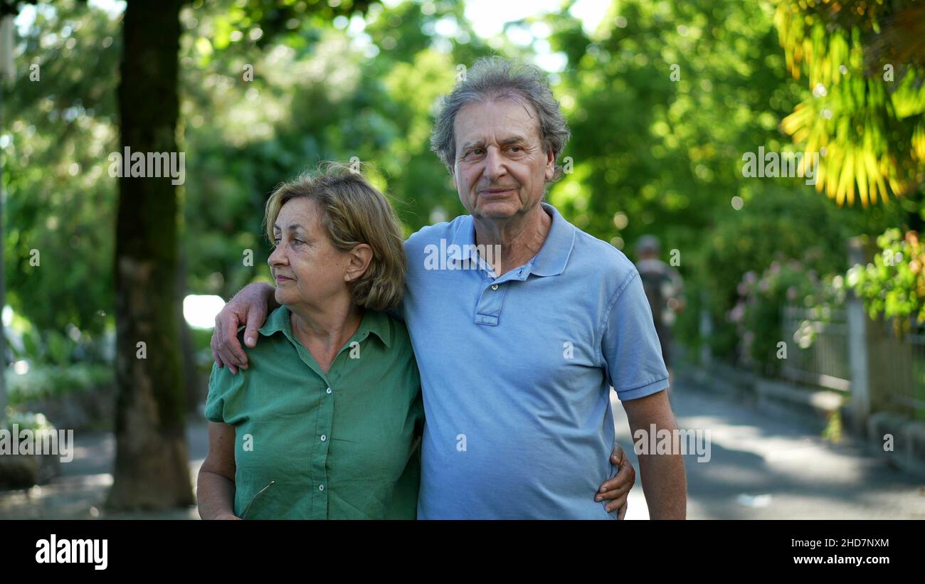 Happy senior couple in 60s walking embracing each other, old age relationship Stock Photo - Alamy