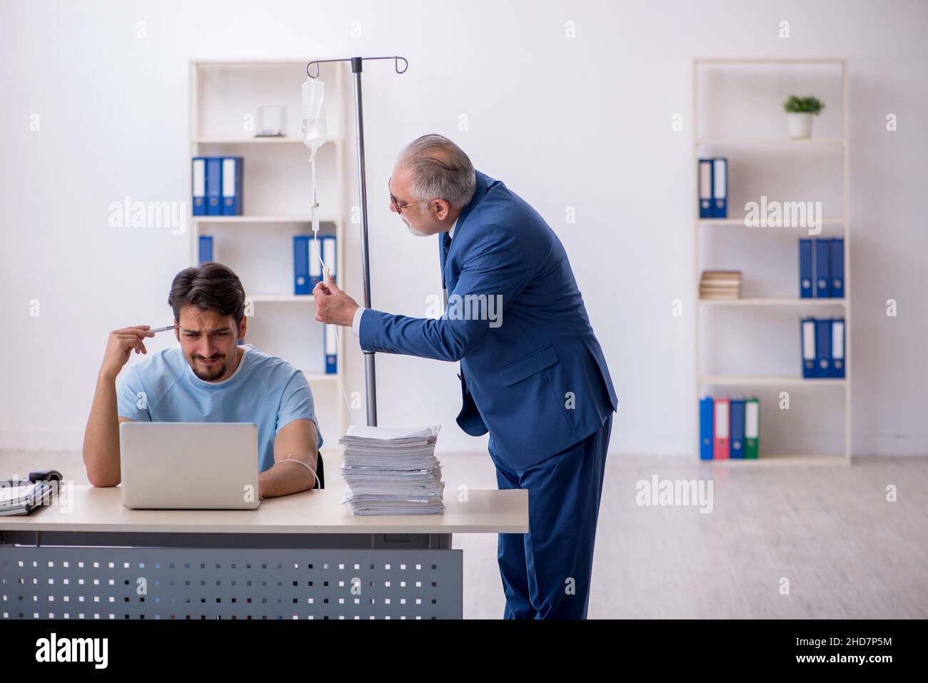Young employee feeling bad at workplace Stock Photo - Alamy