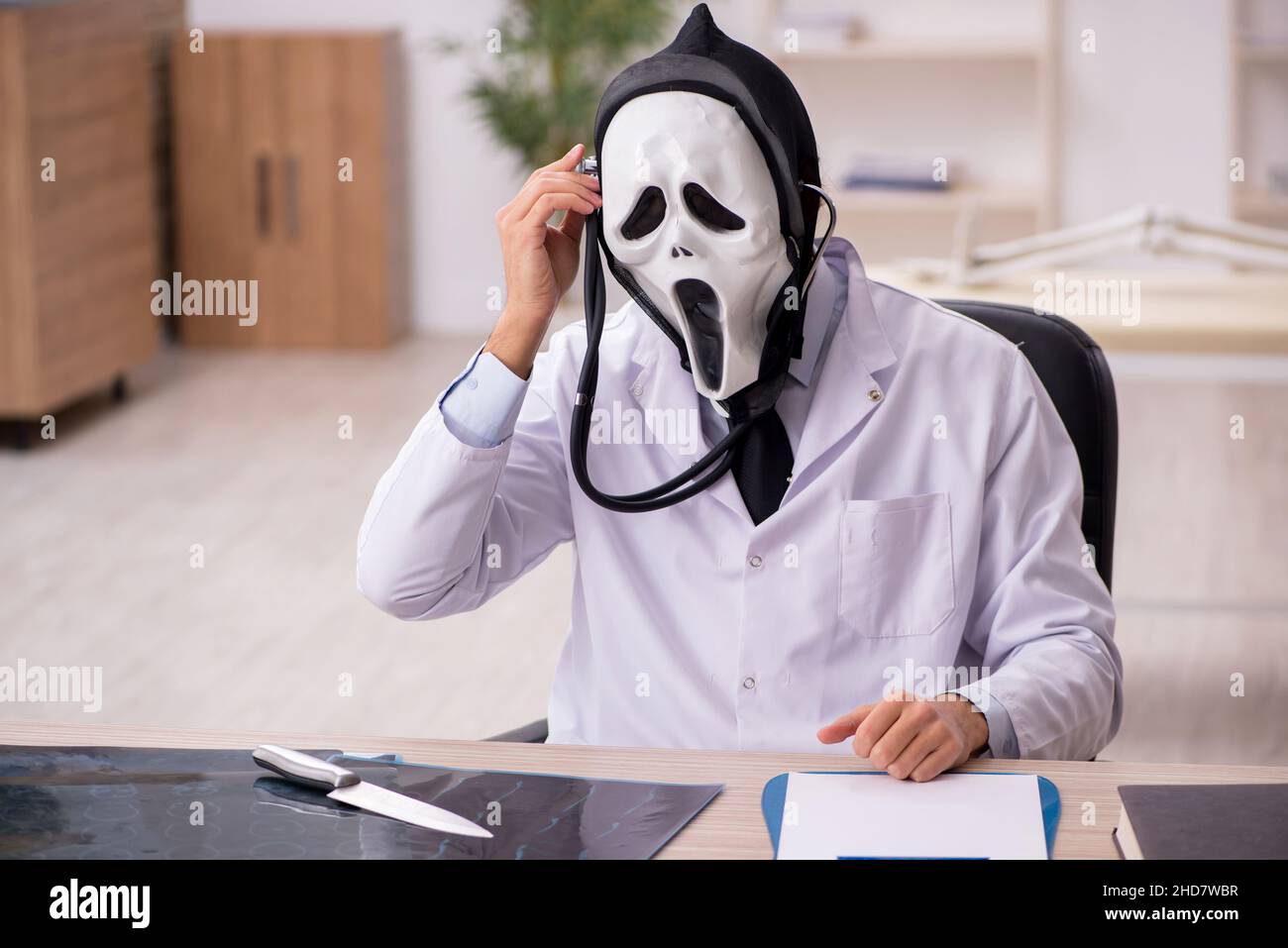 Devil doctor working at the hospital Stock Photo - Alamy