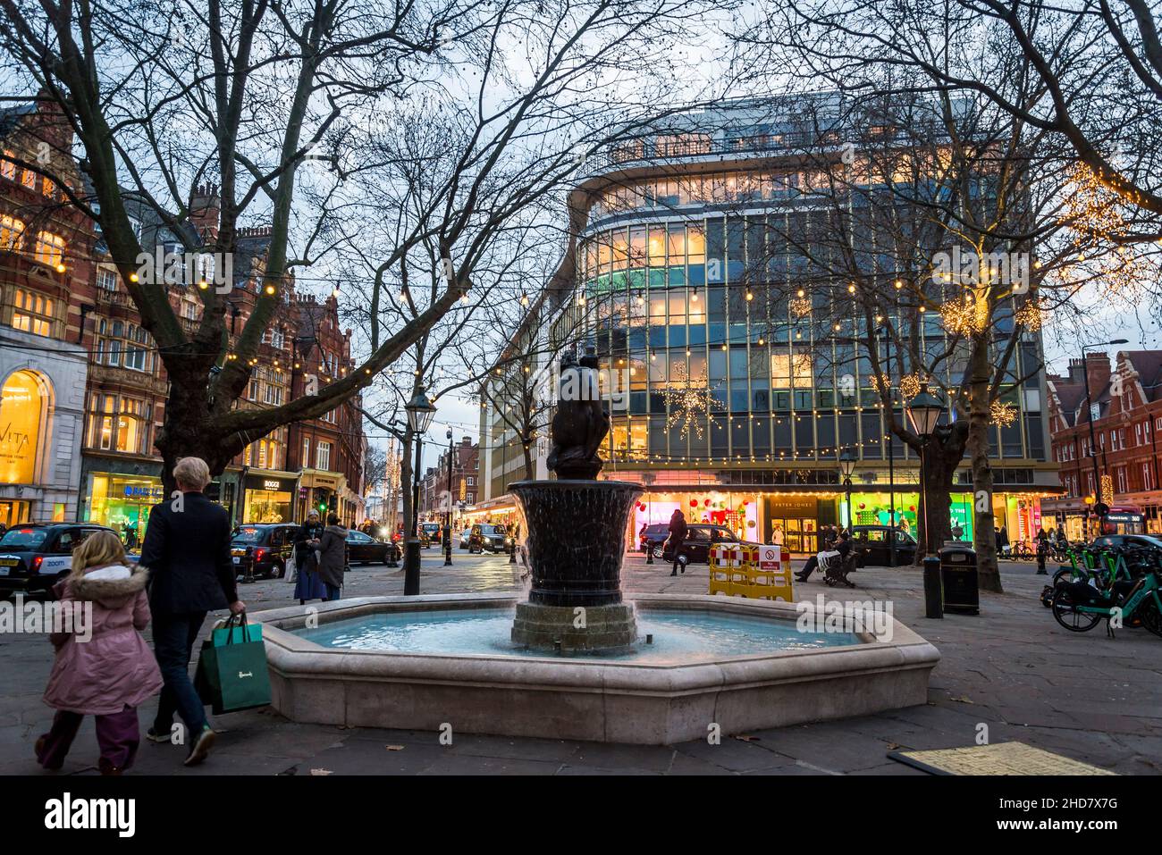 Sloane Square, a memorial city park decorated with Christmas lights ...