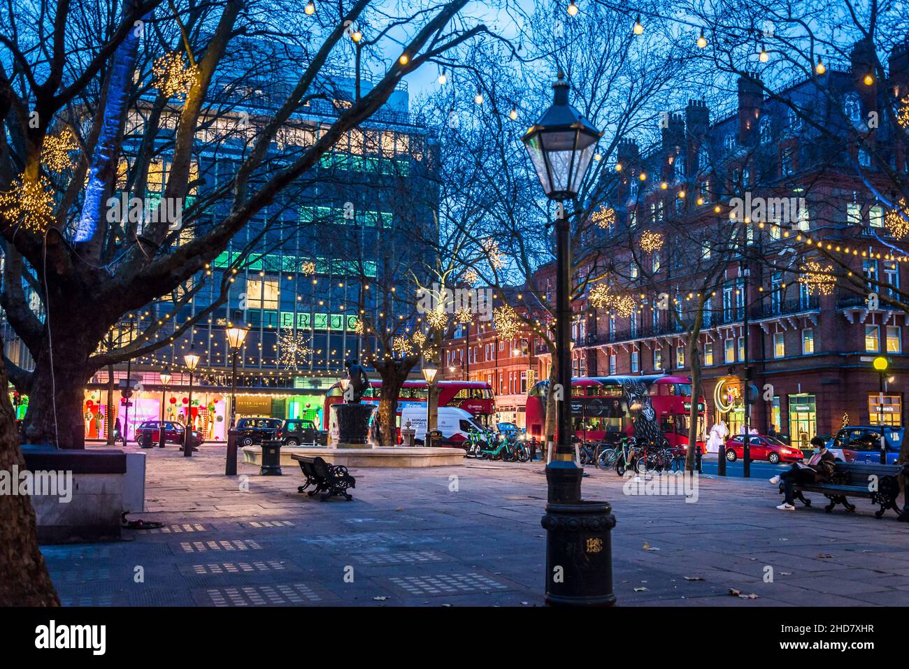 Sloane Square, a memorial city park decorated with Christmas lights ...