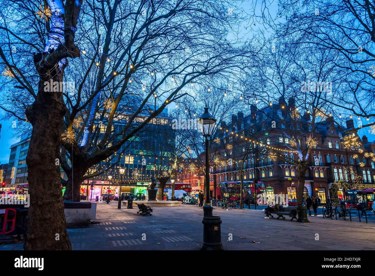 Sloane Square, a memorial city park decorated with Christmas lights ...