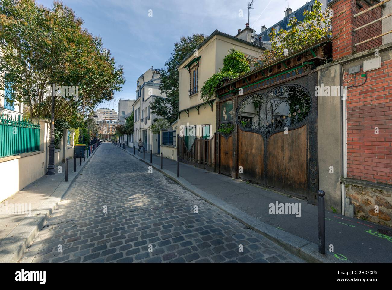 Paris, France - March 28, 2021: Nice small cosy street in Paris with ...