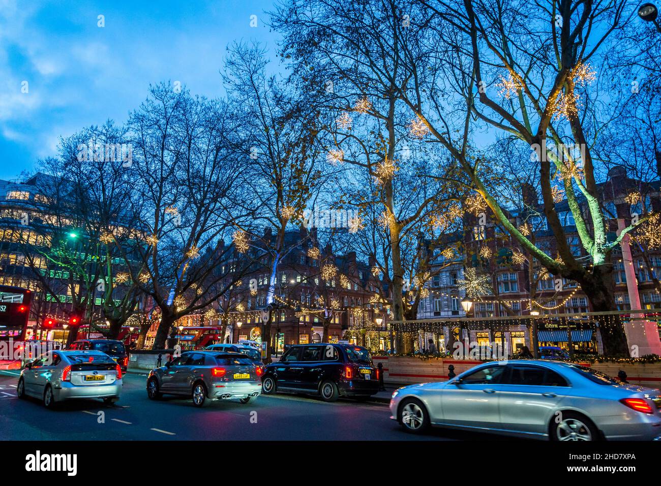 Sloane Square, a memorial city park decorated with Christmas lights ...