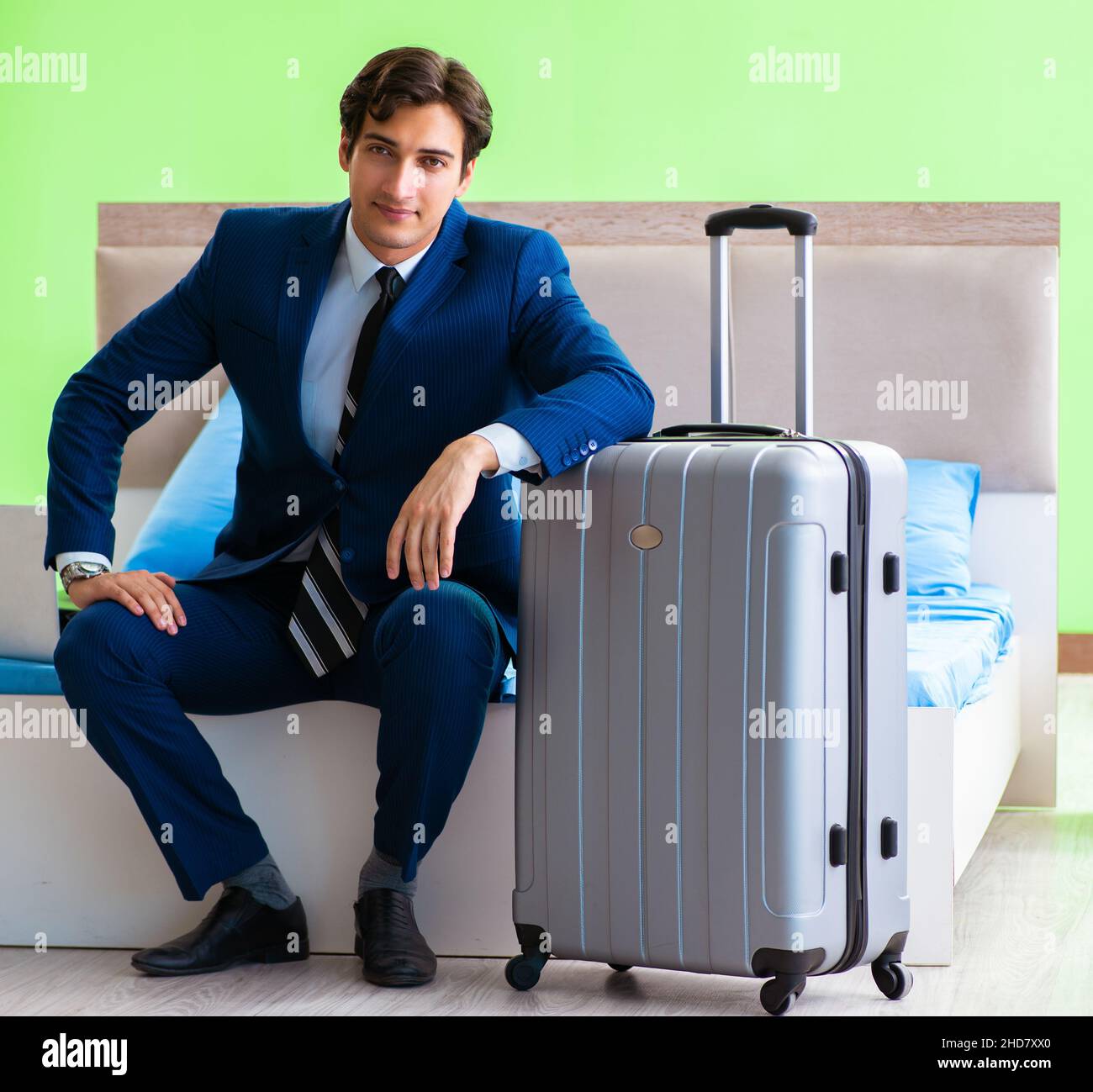 The businessman working in the hotel room Stock Photo - Alamy