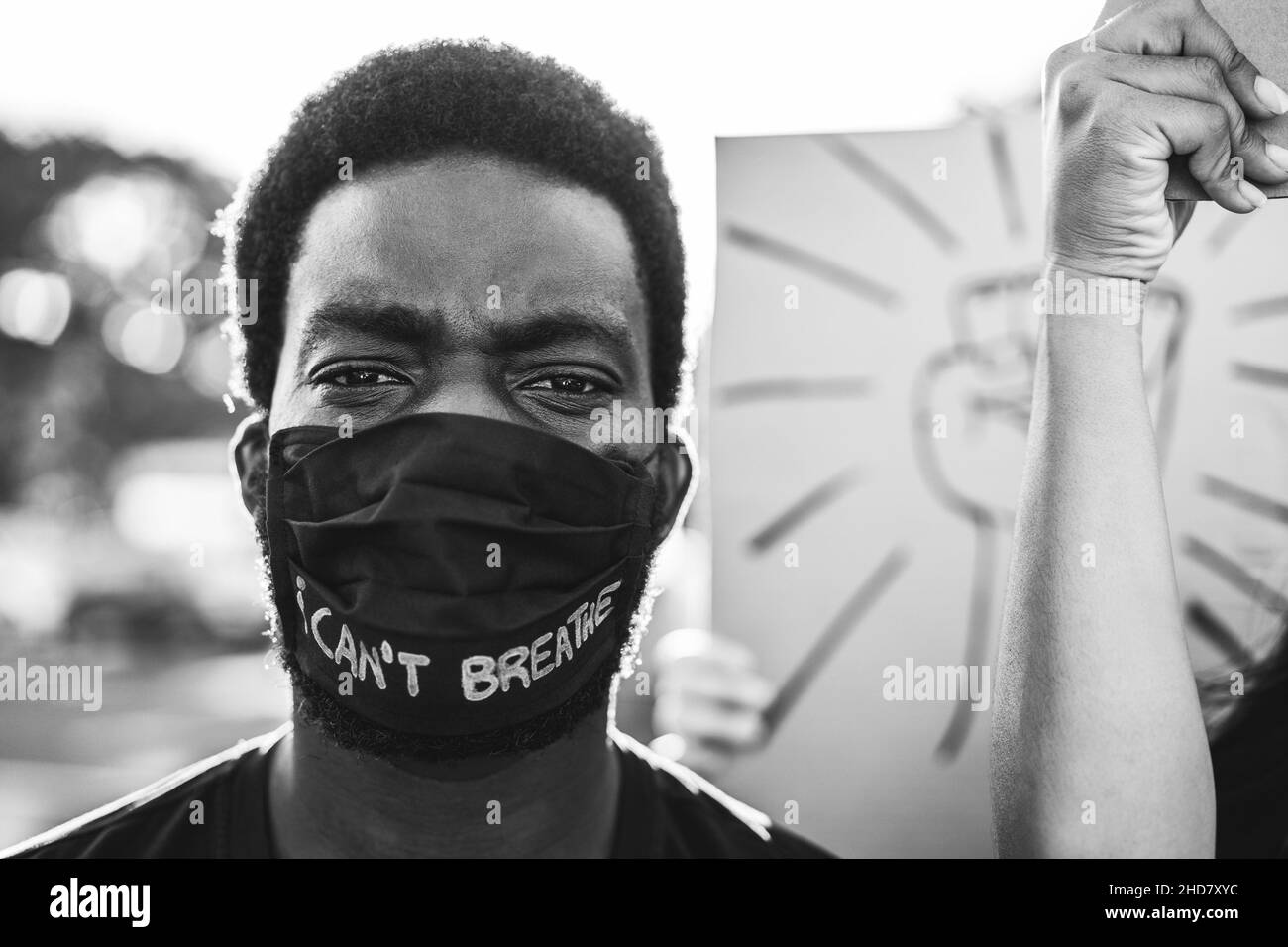Man wearing black face mask Black and White Stock Photos & Images - Alamy