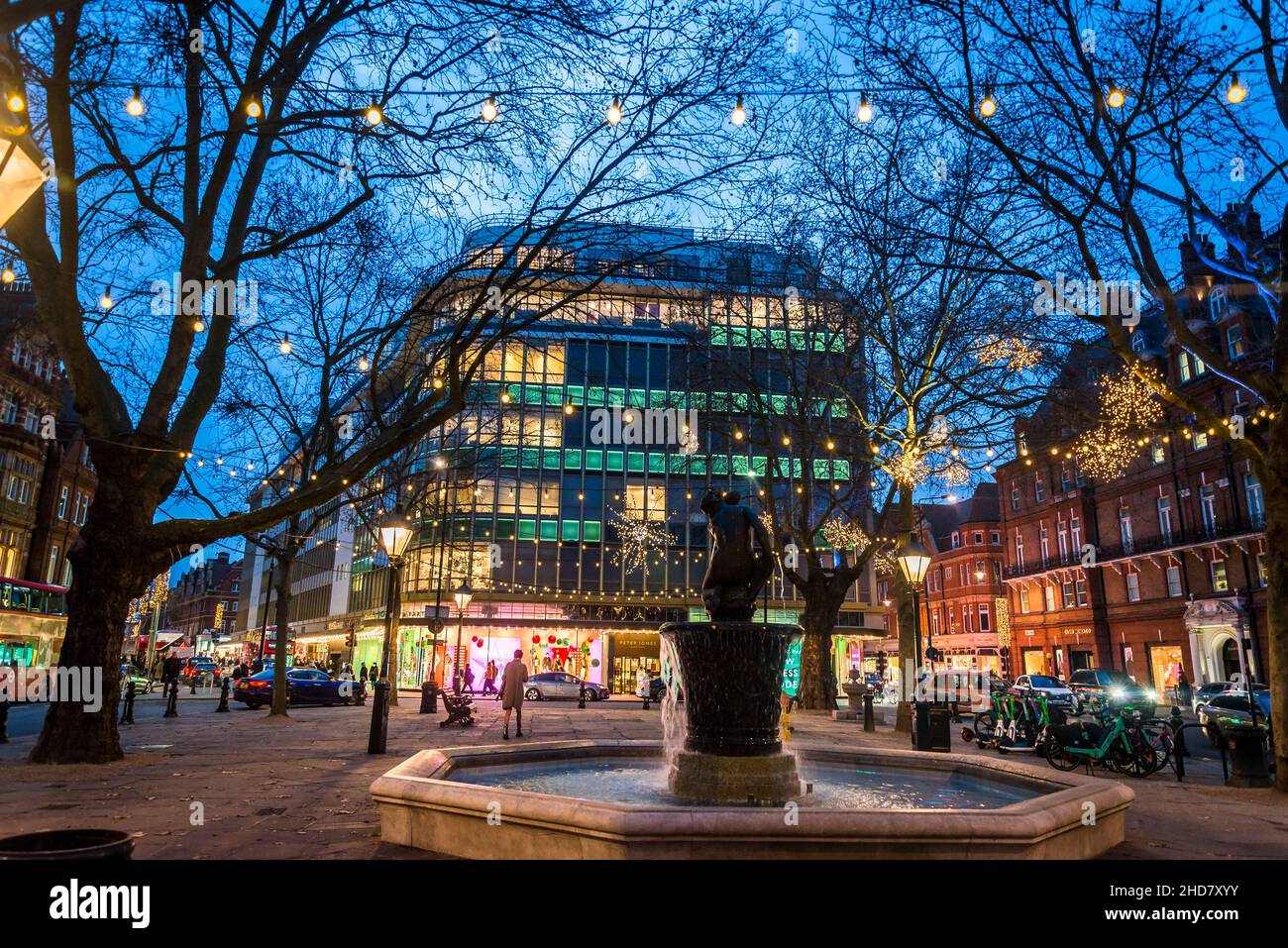 Sloane Square, a memorial city park decorated with Christmas lights ...