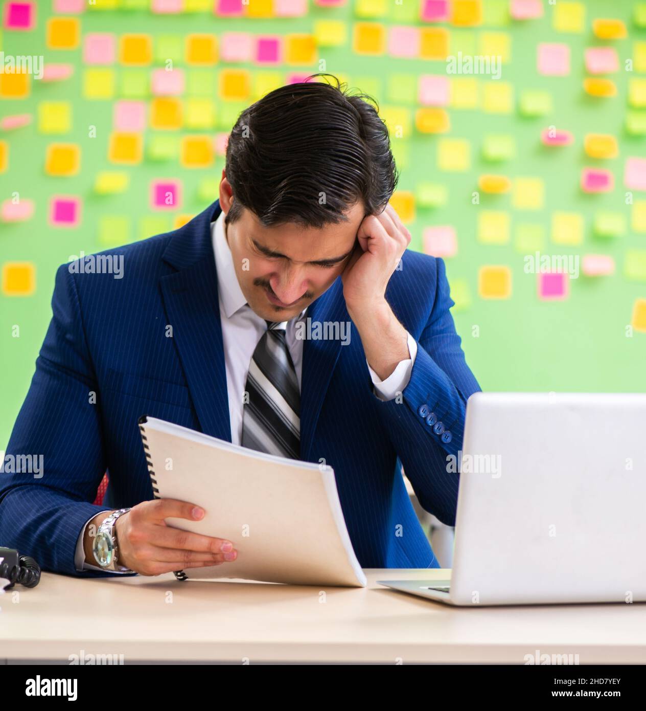 The businessman with many conflicting priorities Stock Photo - Alamy