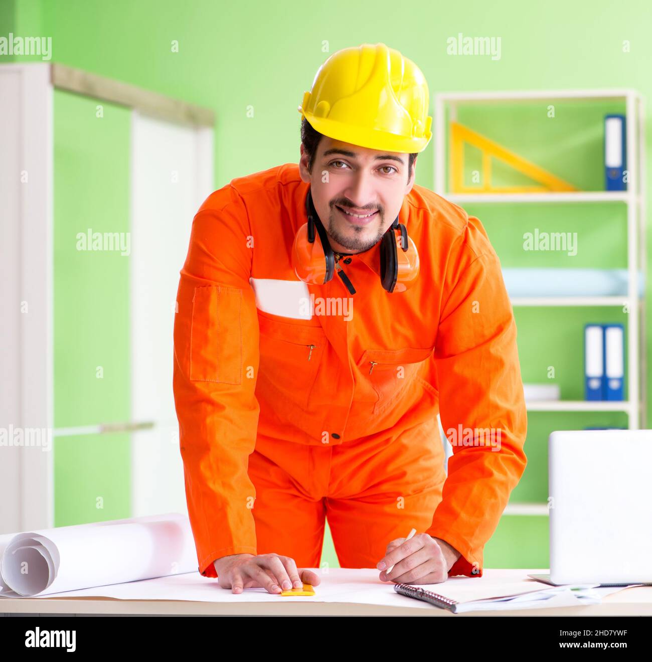 The construction supervisor planning new project in office Stock Photo ...