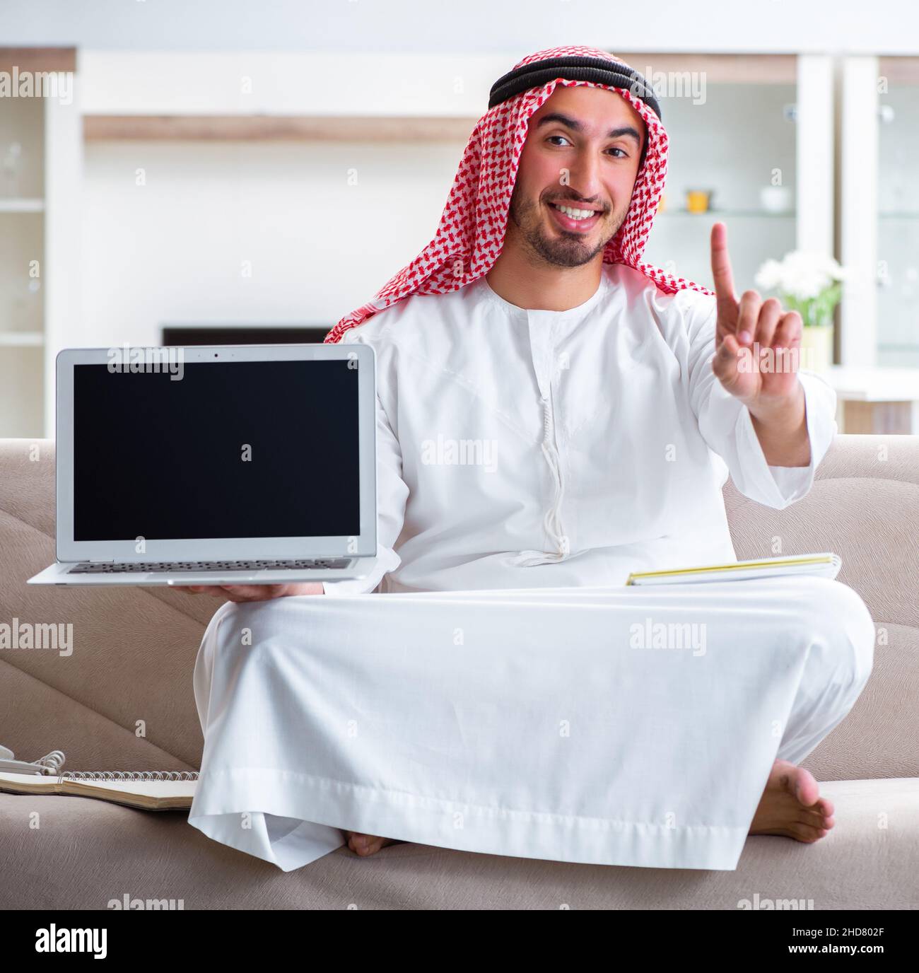 The arab man working at home on his work Stock Photo - Alamy