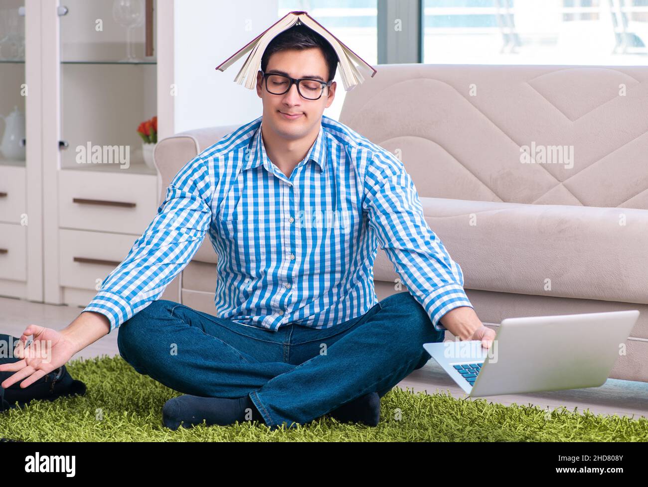 The student meditating and preparing for university exams Stock Photo ...