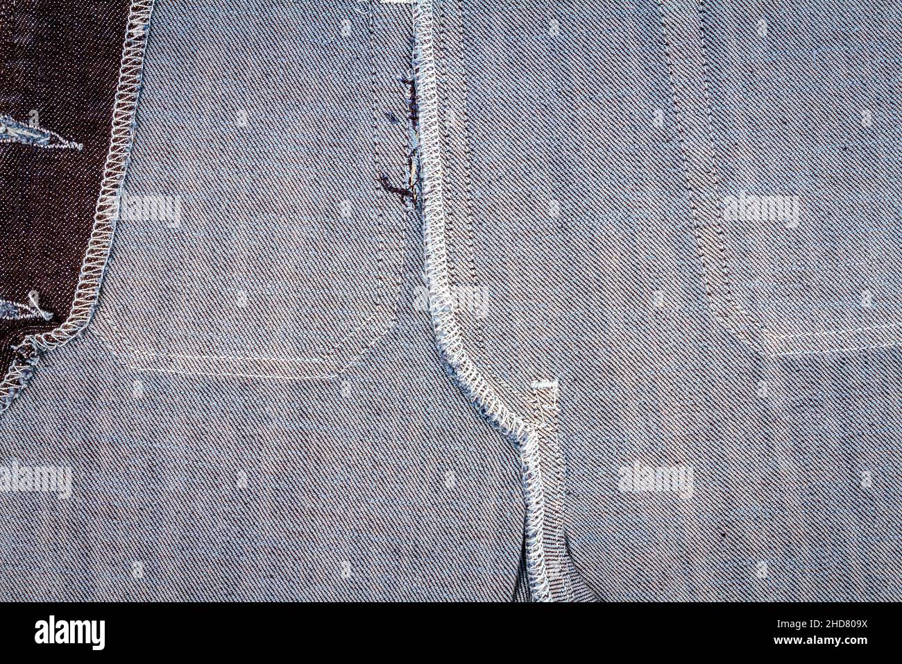 Back side of jeans fabric with a seam Stock Photo - Alamy