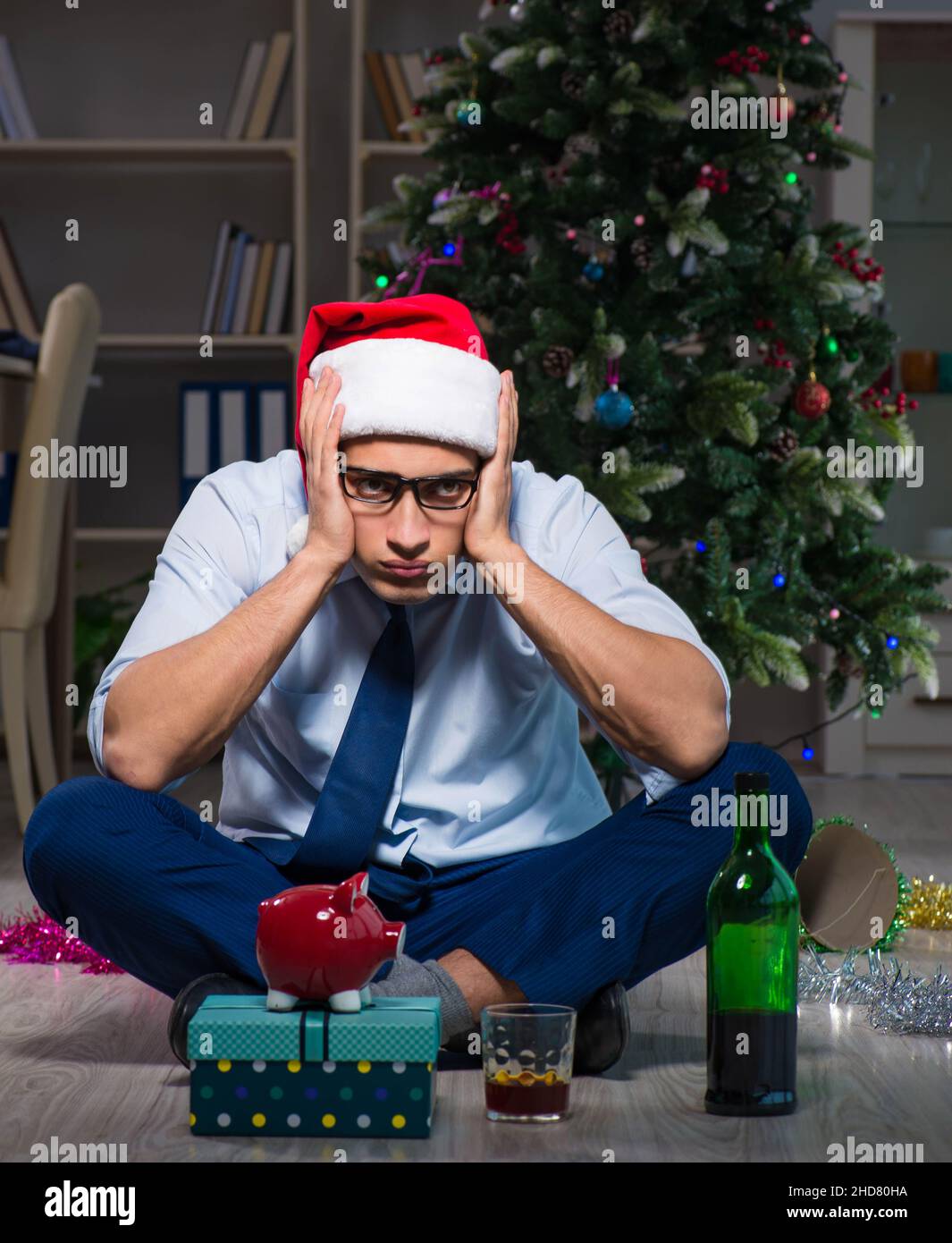 The businessman celebrating christmas at home alone Stock Photo - Alamy
