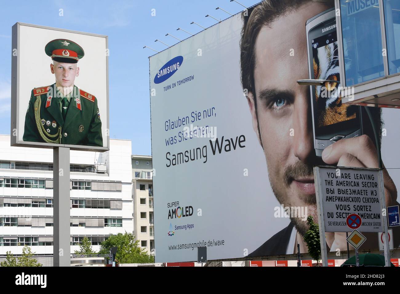 View of sign board at Checkpoint Charlie in summer. Former border ...