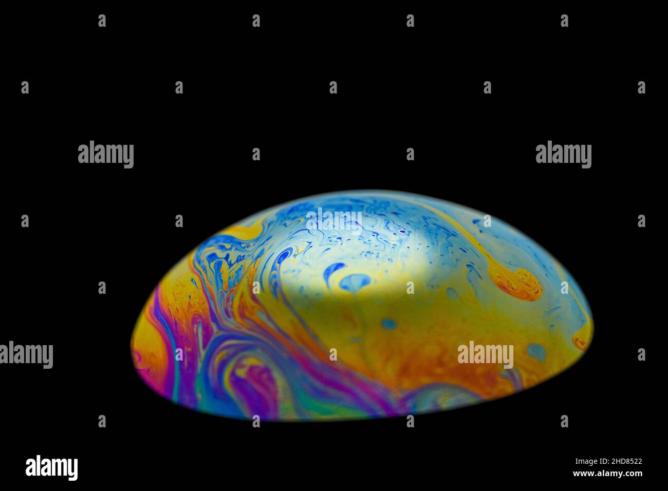 Multicolor psychedelic alien planet with an atmosphere in the darkness ...