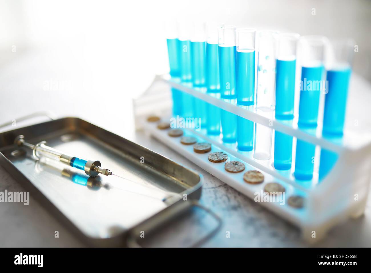 Test tube of glass overflows new liquid solution potassium blue ...