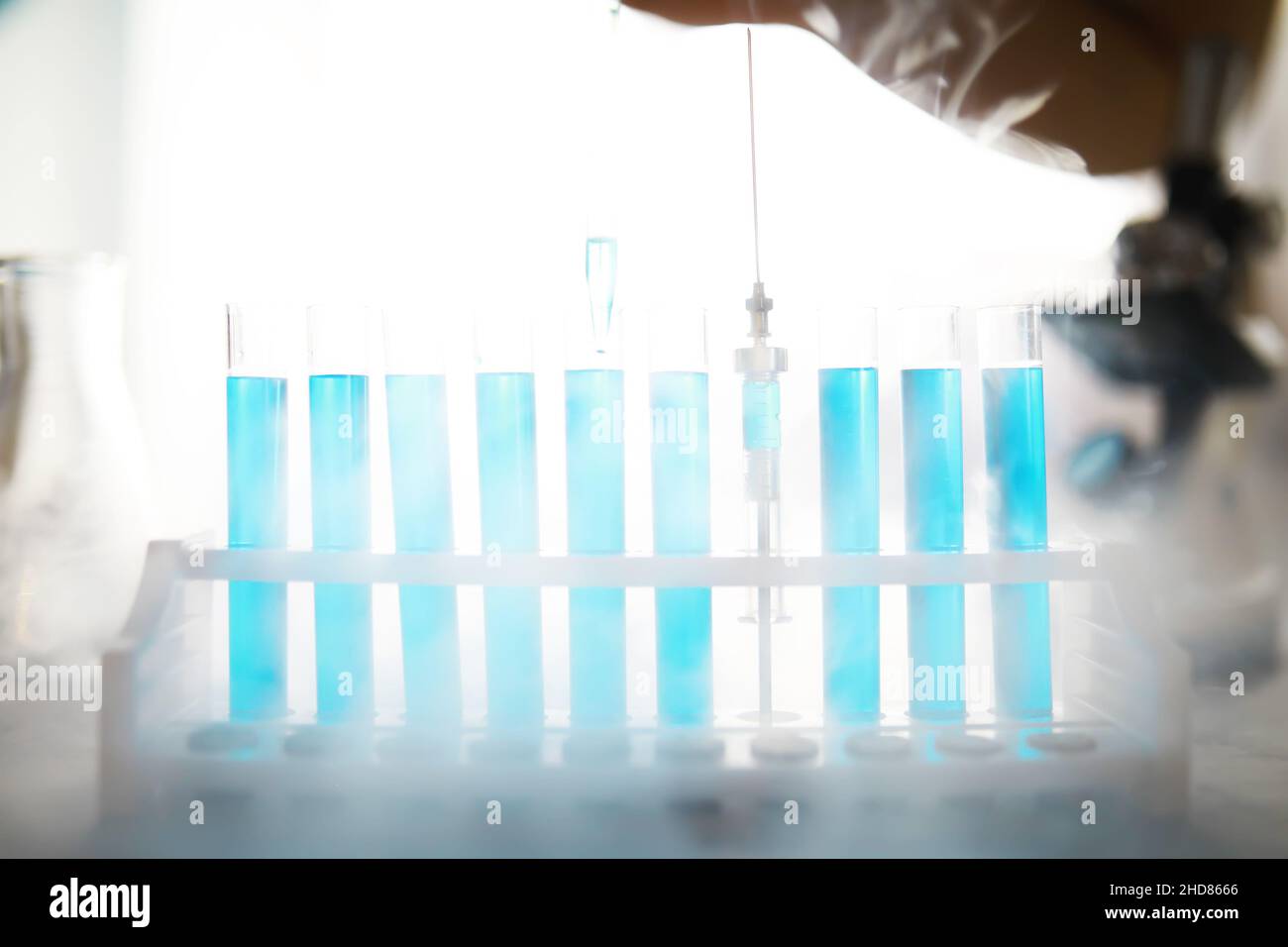 Test tube of glass overflows new liquid solution potassium blue ...